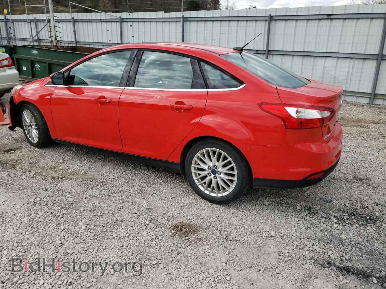 Report 1FAHP3H27CL201165 FORD FOCUS 2012 RED GAS - price and damage history