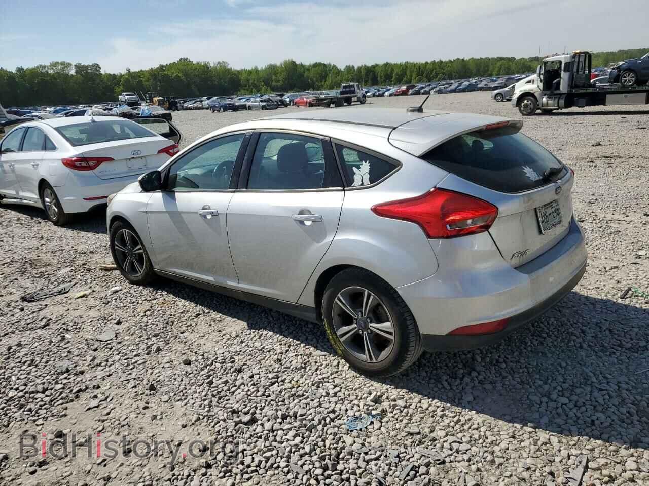 Report 1FADP3KE4GL243879 FORD FOCUS 2016 SILVER GAS - price and damage ...