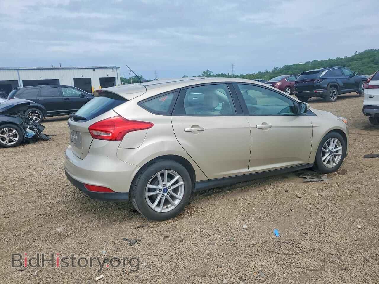 Report 1FADP3K26JL206619 FORD FOCUS 2018 GOLD GAS - price and damage ...
