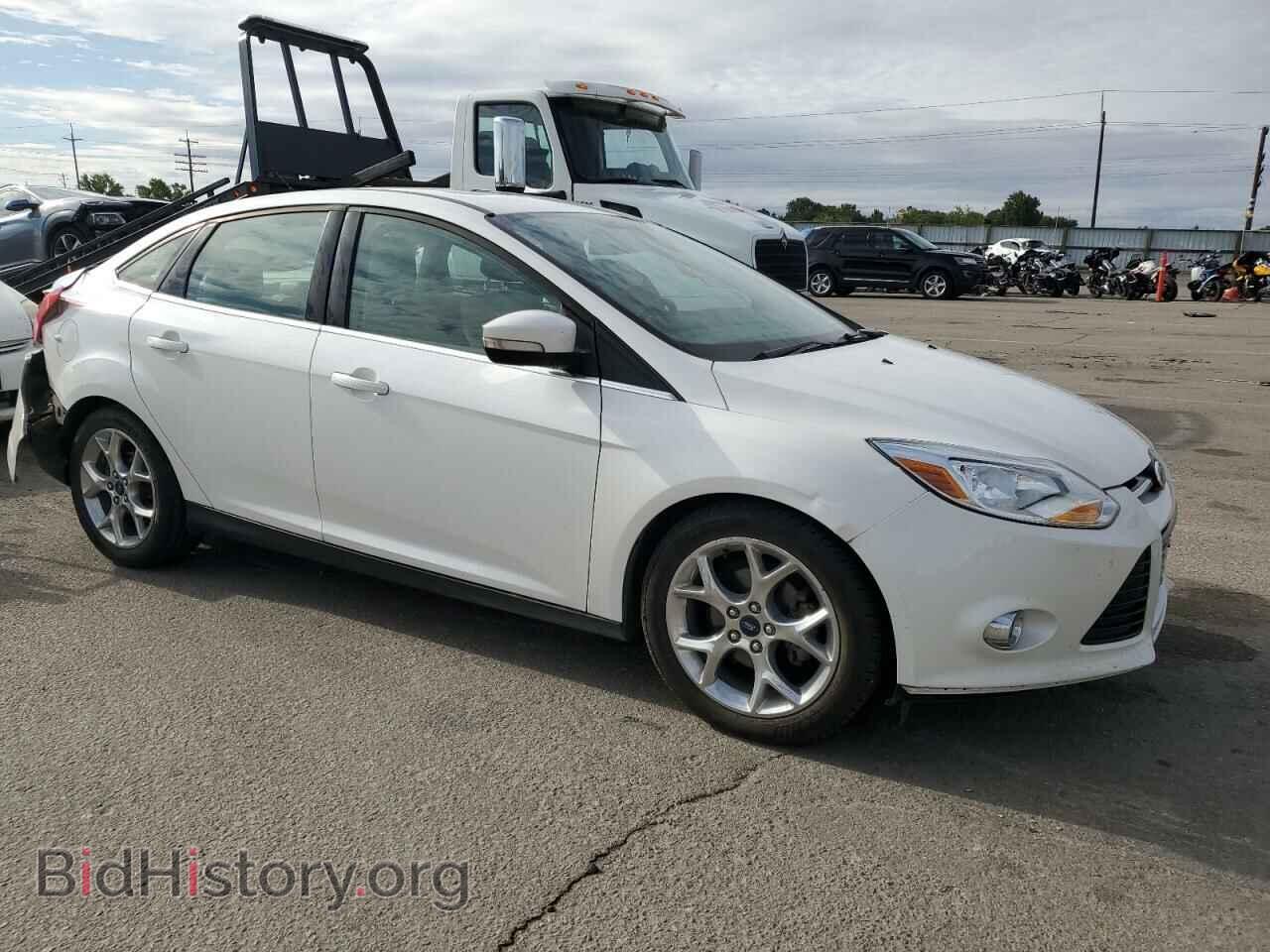 Report 1FAHP3H25CL347645 FORD FOCUS 2012 WHITE GAS - price and damage ...
