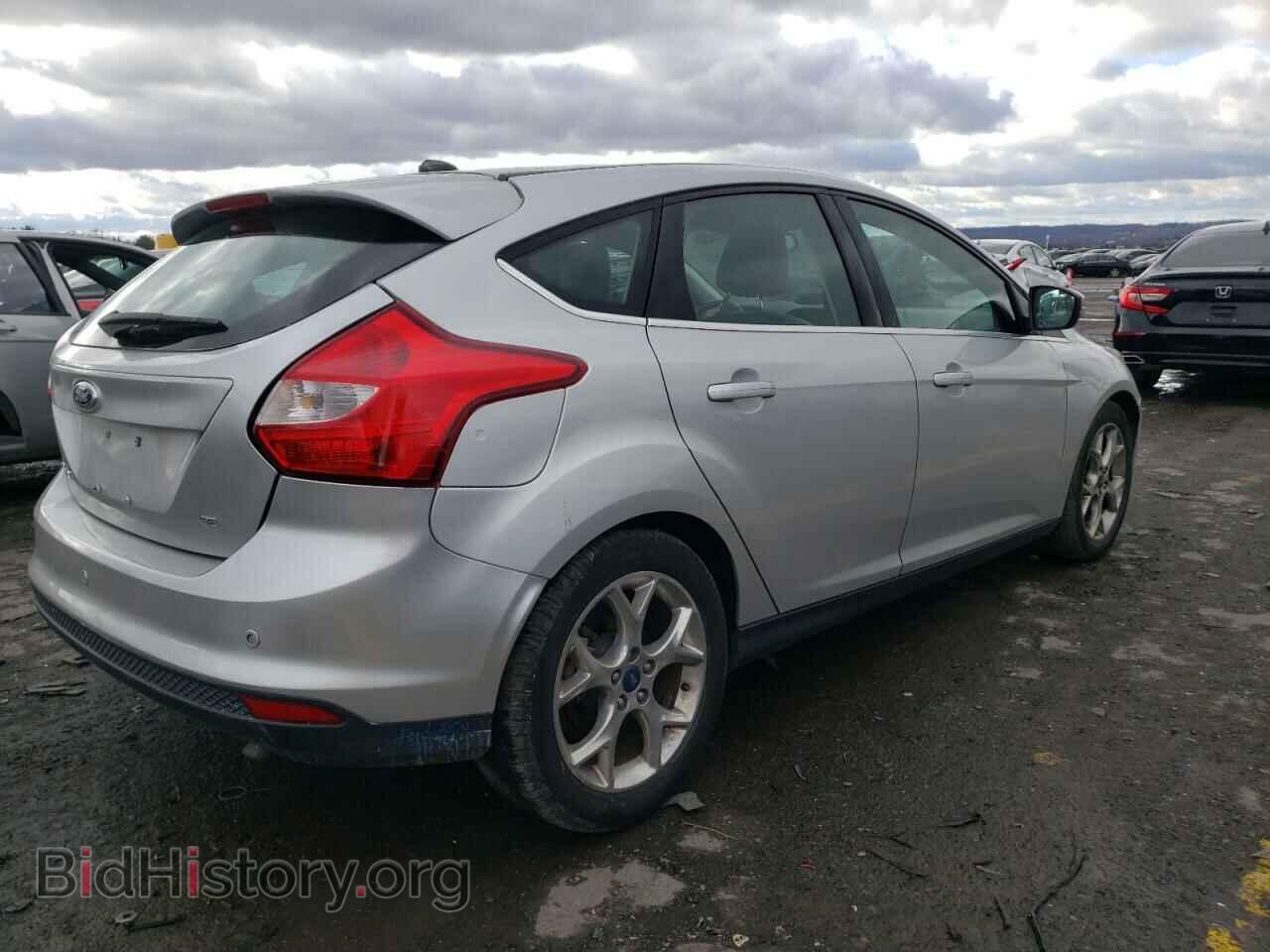 Report 1FAHP3M2XCL323976 FORD FOCUS 2012 SILVER GAS - price and damage ...