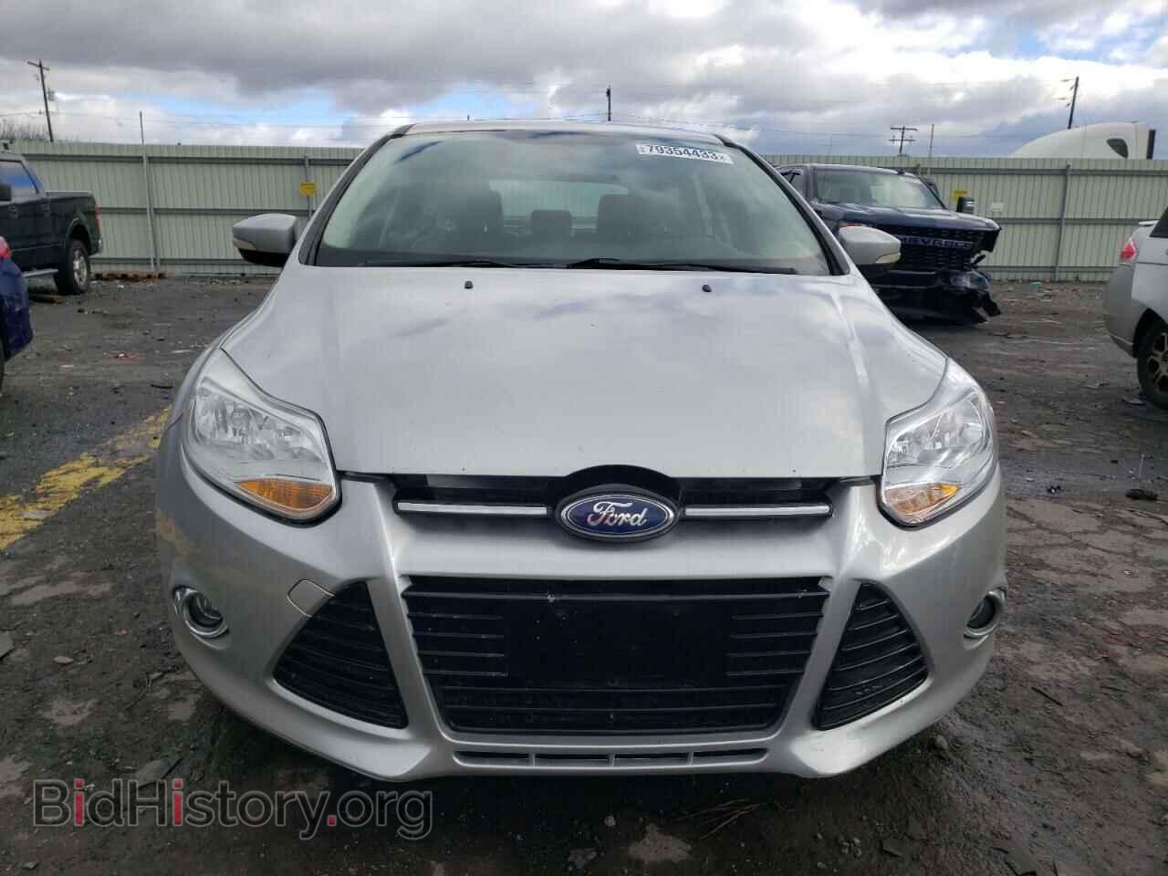 Report 1FAHP3M2XCL323976 FORD FOCUS 2012 SILVER GAS - price and damage ...