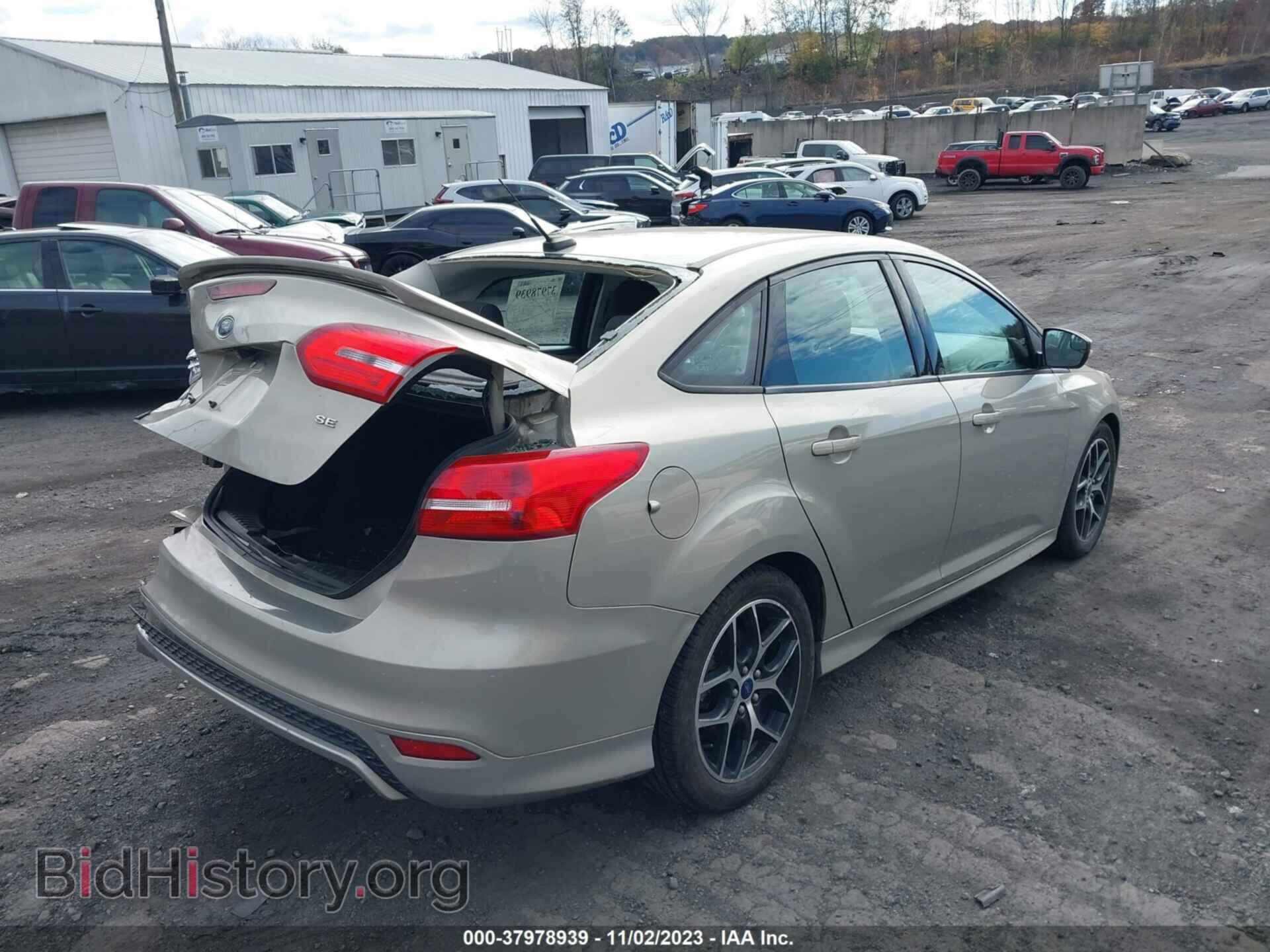 Report 1FADP3F21GL210550 FORD FOCUS 2016 Silver Flexible Fuel - price ...
